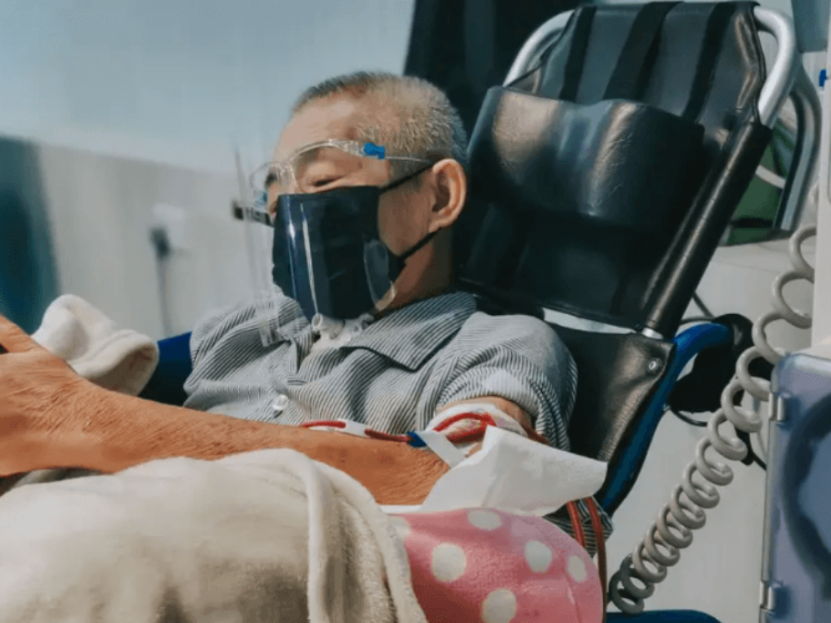 Cancer Patient In Hospital Bed